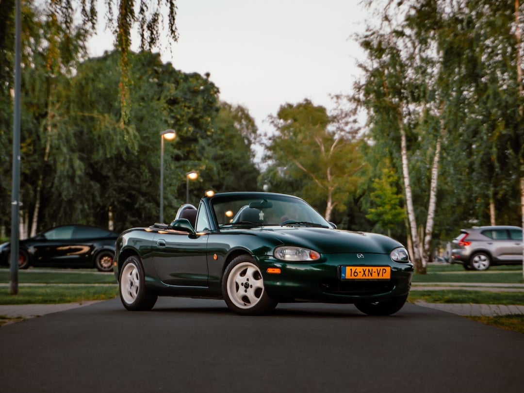 my miata before and after lowering - EVSHIFT
