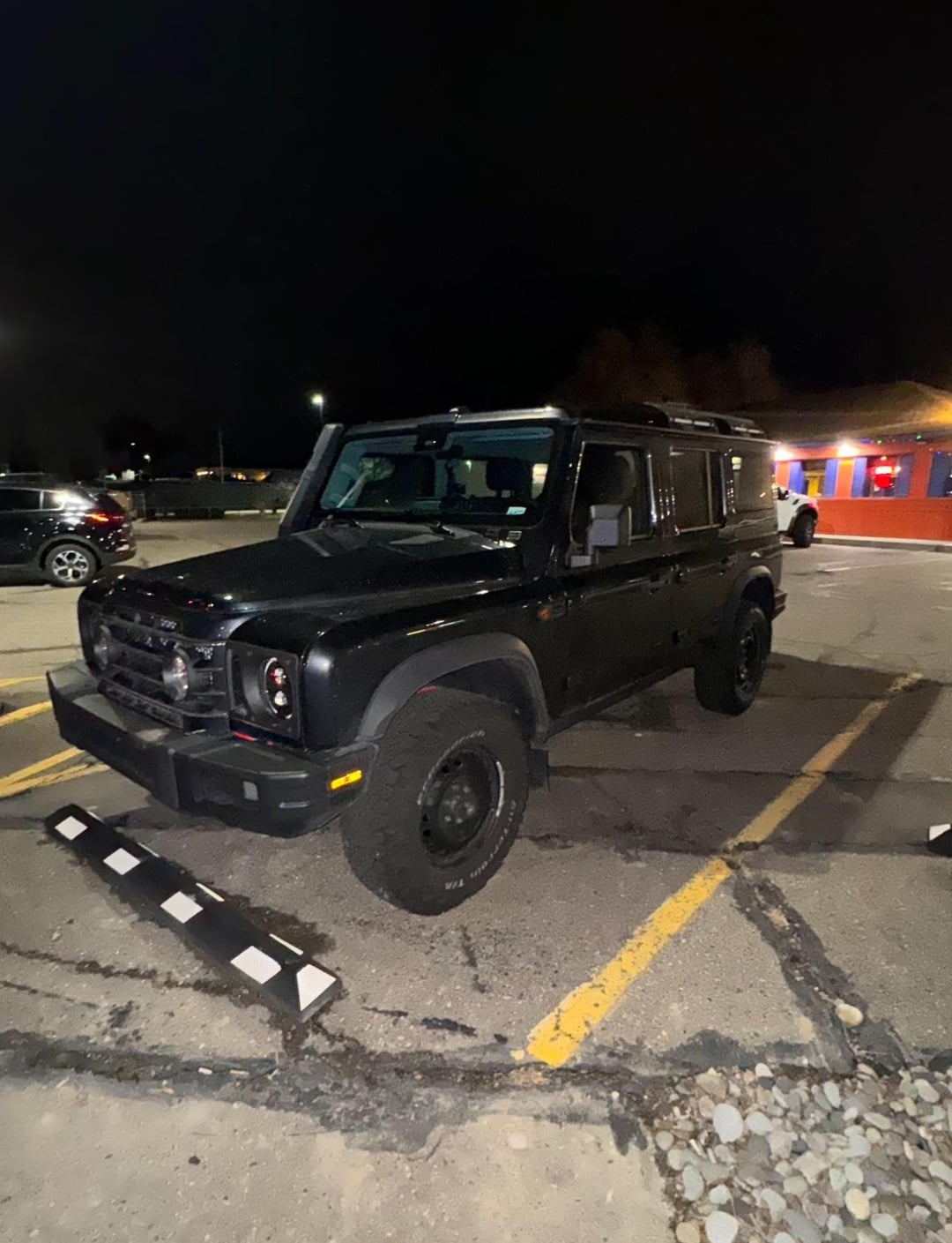 Two pics of an [INEOS Grenadier] with the whole frame in red. Whats up ...