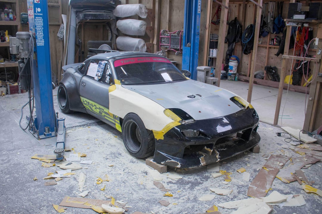 Finished up the custom widebody Rx7 front for my cyberpunk Miata build ...