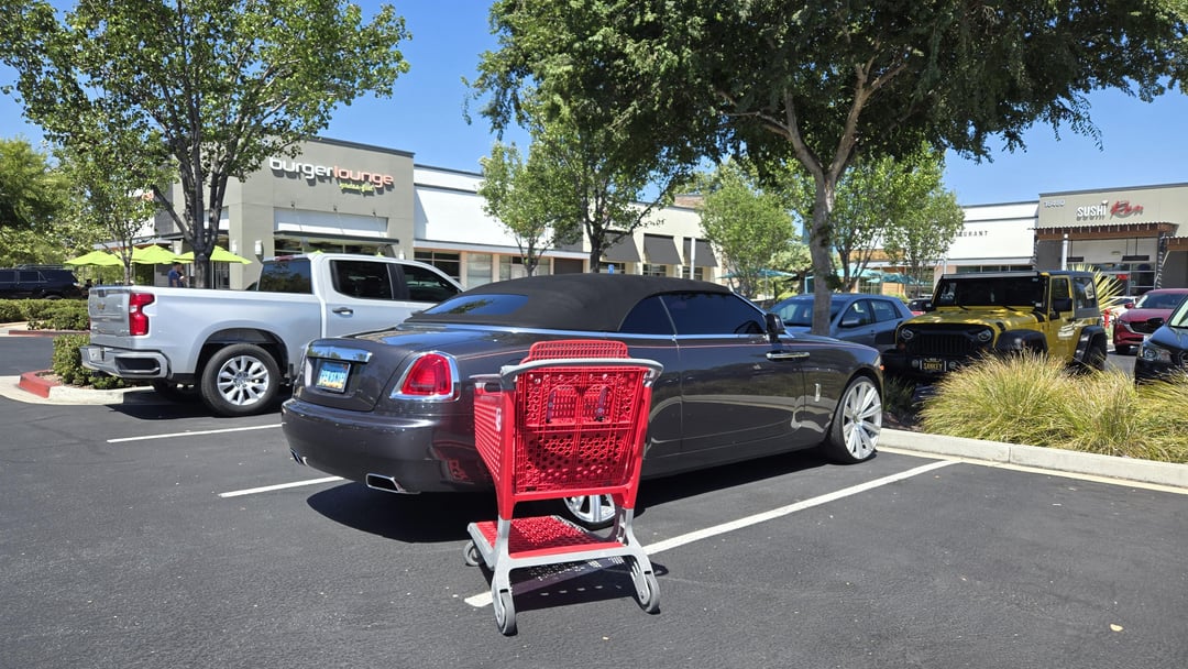 Saw this [Rolls Royce Dawn] with a shopping cart too close for comfort ...