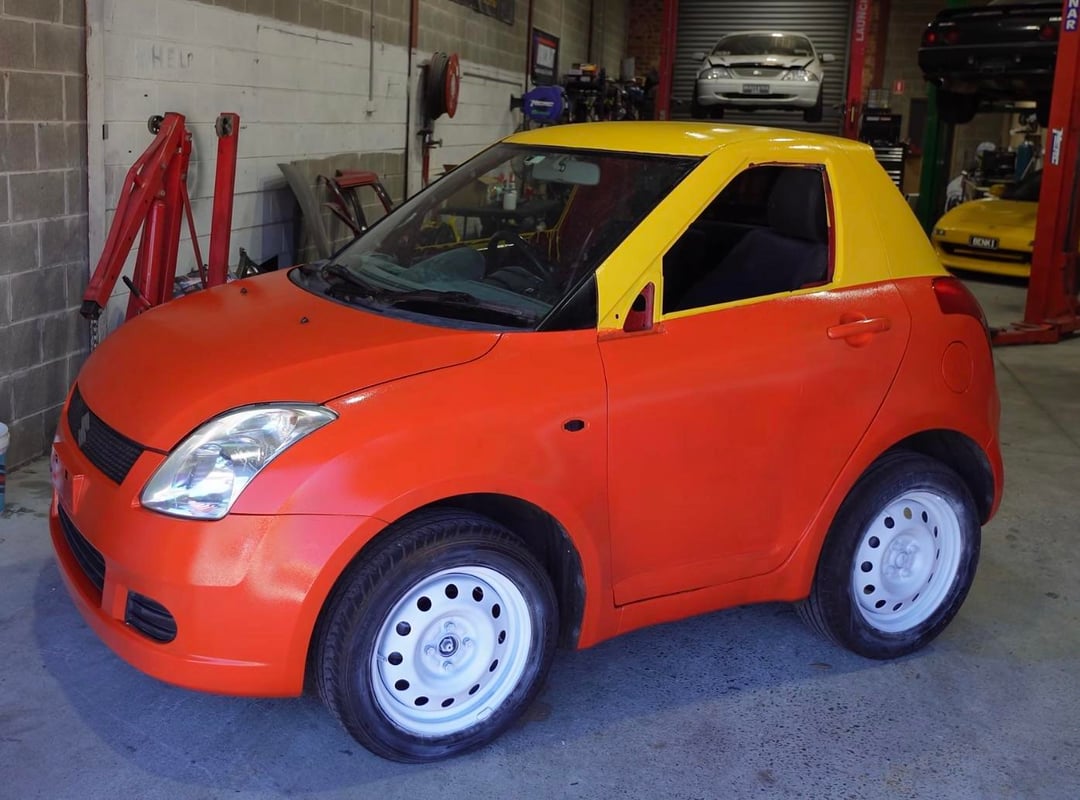 A Suzuki Swift transformed into a Little Tikes Cozy Coupe - EVSHIFT