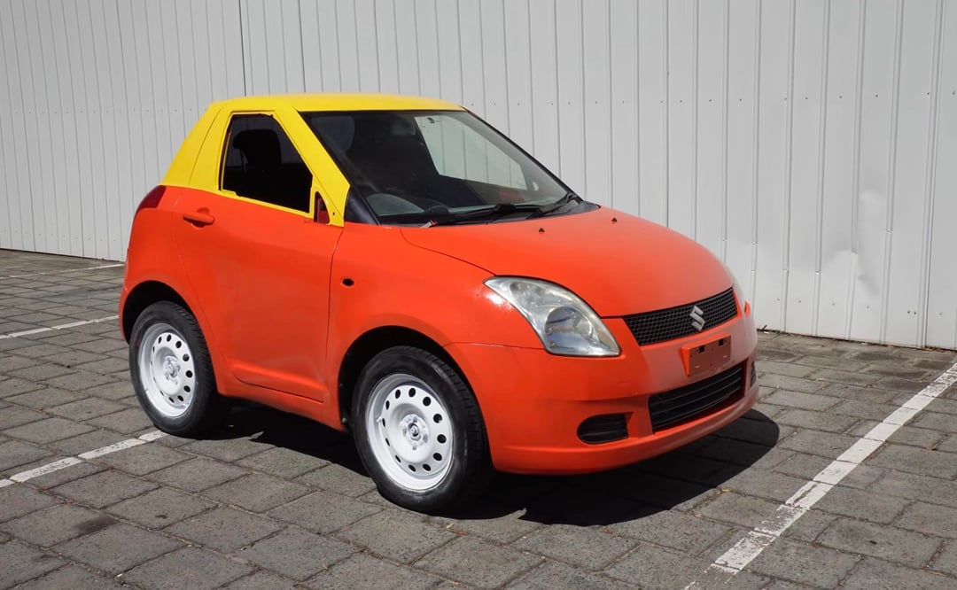 A Suzuki Swift transformed into a Little Tikes Cozy Coupe - EVSHIFT