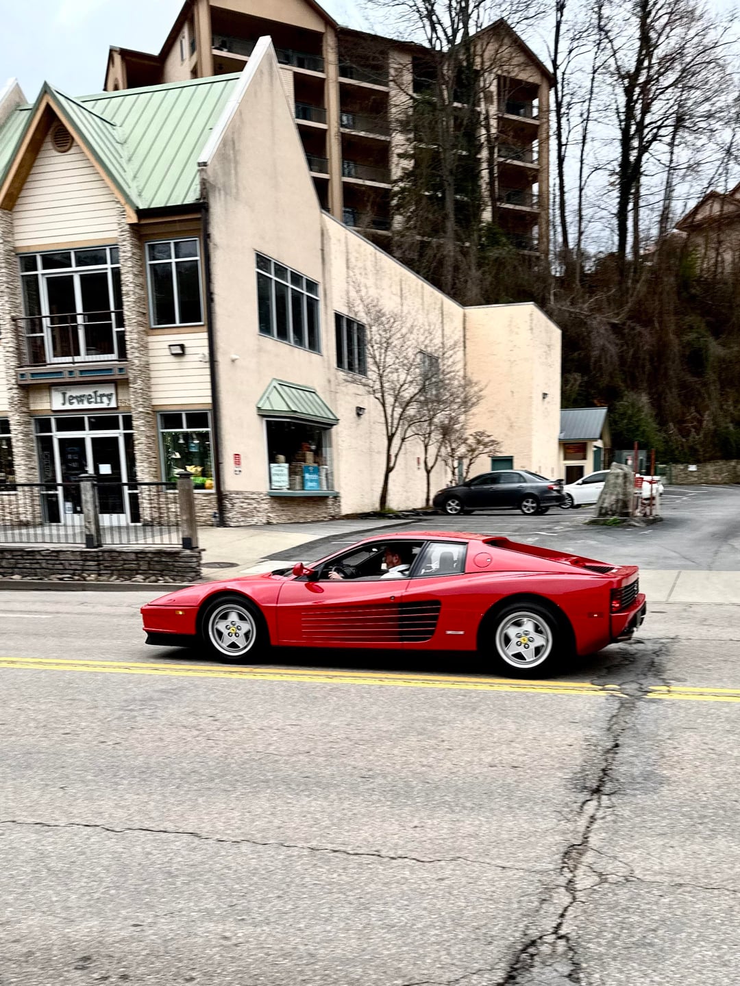 The iconic [Ferrari Testarossa] on a grey morning drive - EVSHIFT